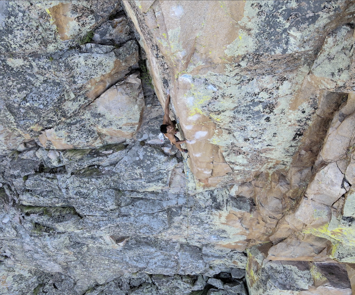 Dan Yager climbing on the Godfather, 13a/b.
